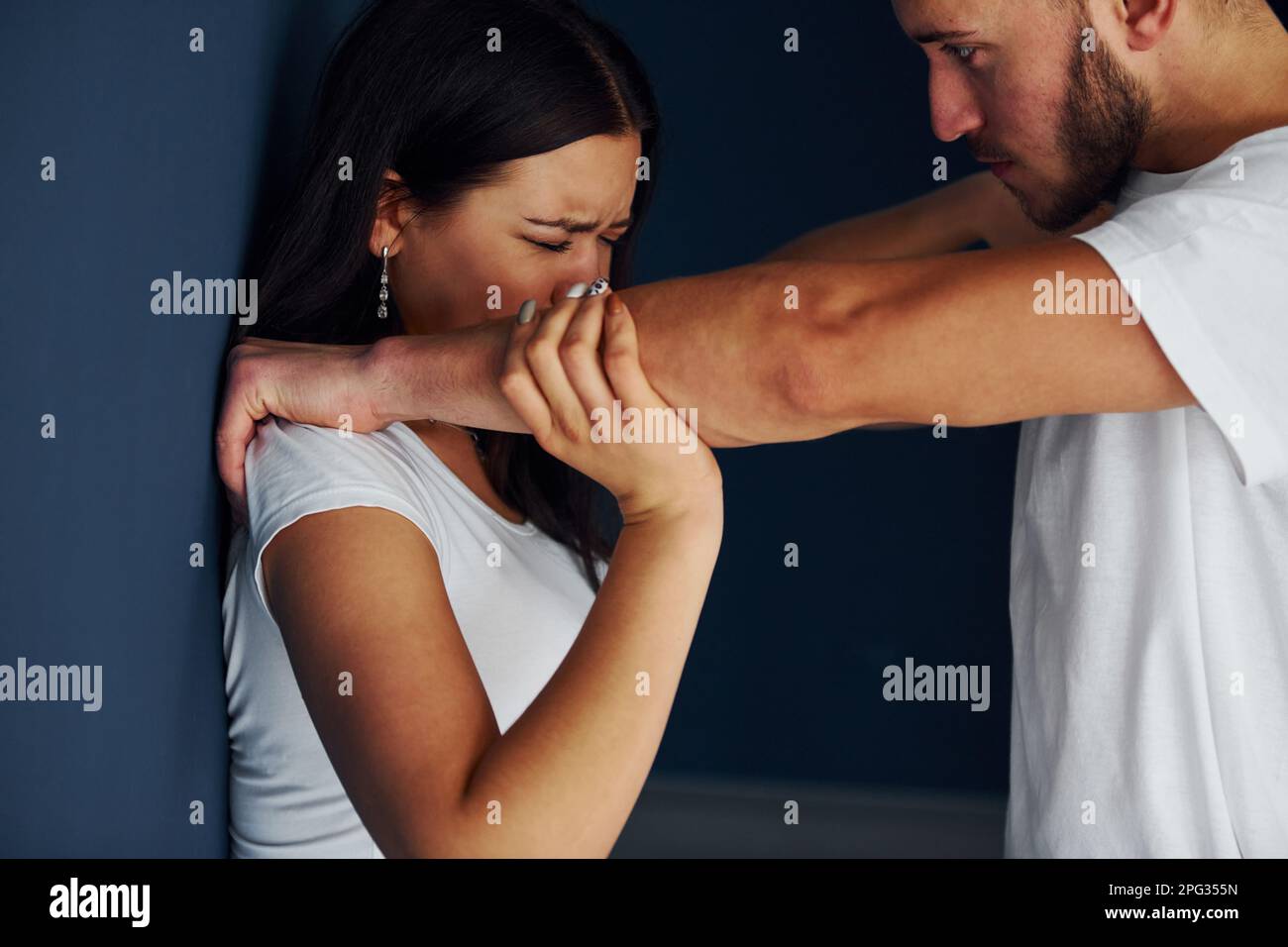 Violent aggressive young man beats his girlfriend at home Stock Photo ...