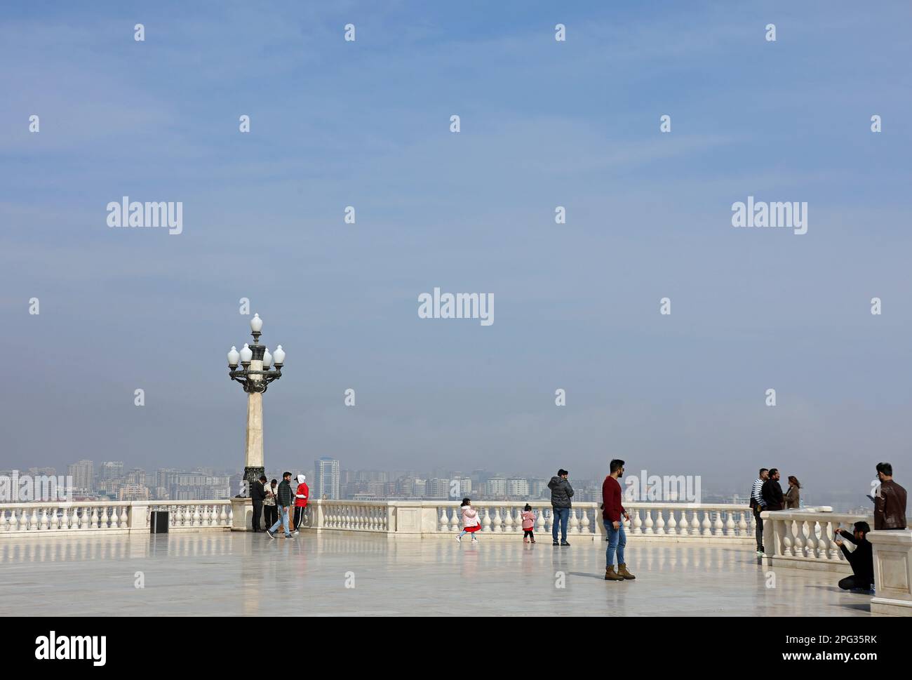 Tourists at Upland Park in Baku with its views over the city and the ...