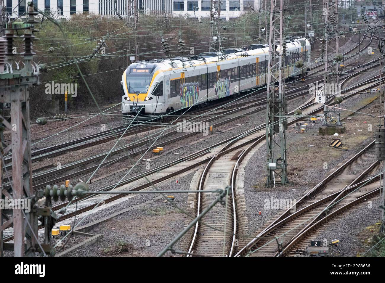 A regional train, Eurobahn, leaves Essen Central Station, feature ...