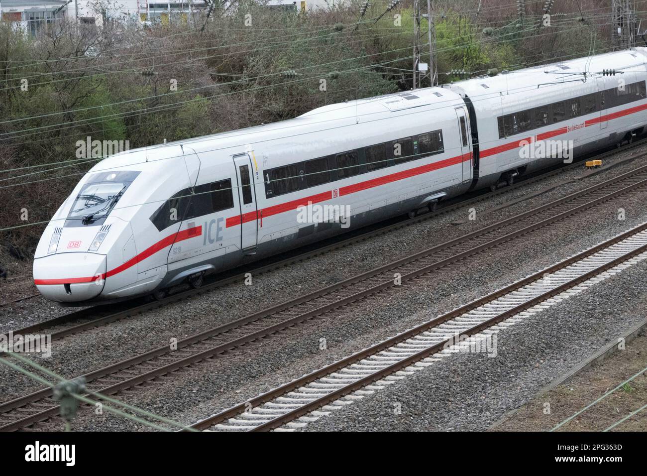 An ICE Intercity Express drives out of Essen Central Station, feature ...