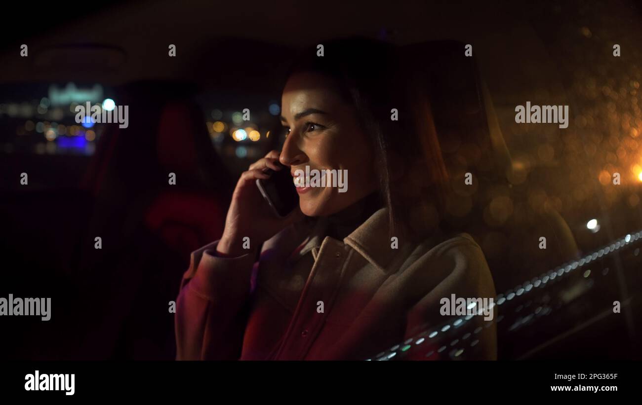 Woman backseat car night hi-res stock photography and images - Alamy