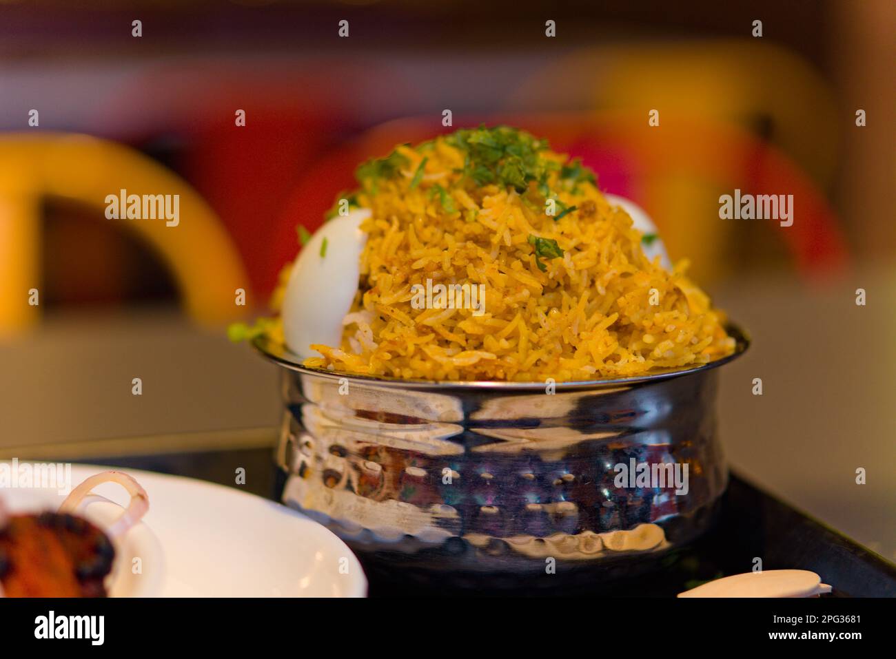 handi chicken biriyani served in resturant Stock Photo - Alamy