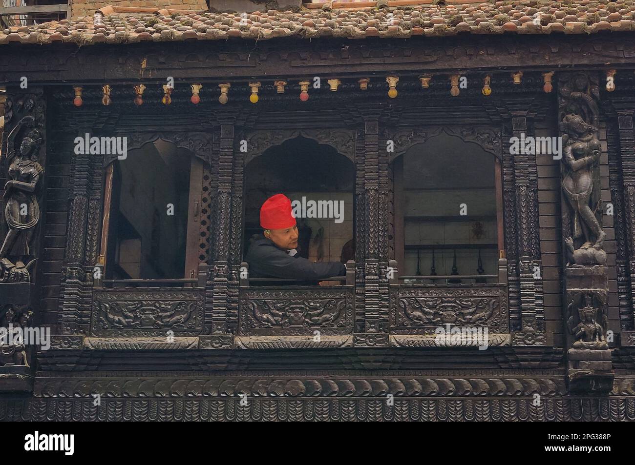 Kathmandu, Bagmati, Nepal. 20th Mar, 2023. A man wearing a colorful cap ...