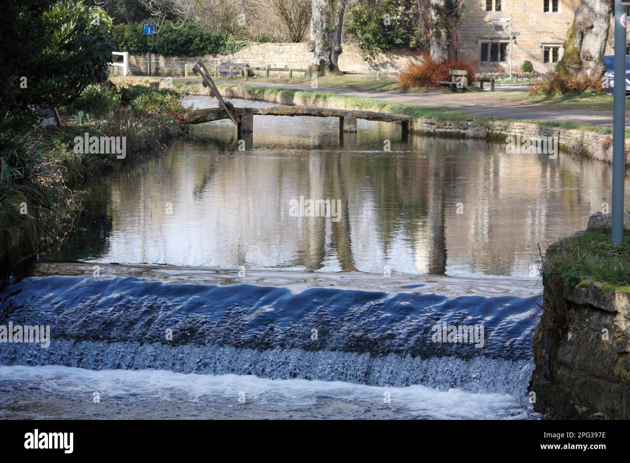 River Eye flowing through the Cotswold Village of Lower Slaughter ...