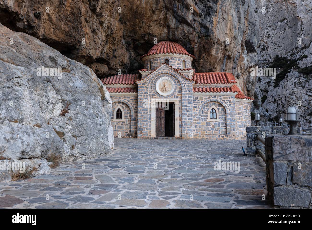 Christian landmark stands in a deep rock gorge, Greece, Crete Stock ...