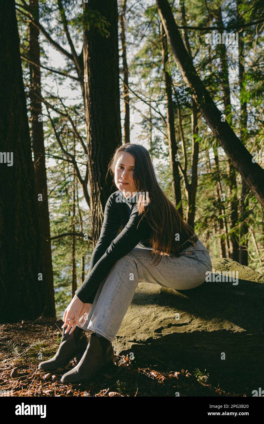 Model cast against nature in Seattle Stock Photo - Alamy