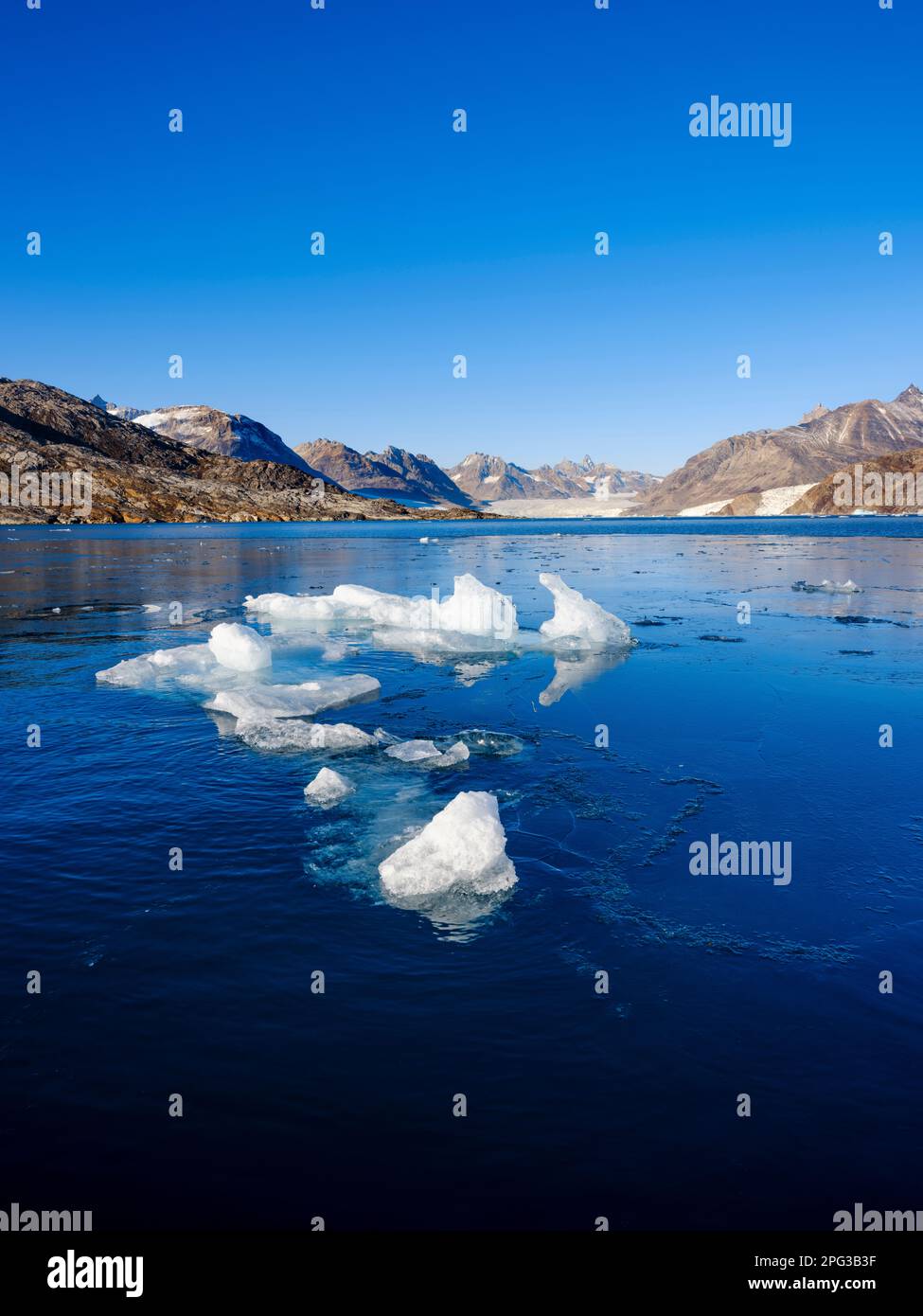 Karale glacier in the Sermiligaaq Fjord, fresh sea ice in the ...