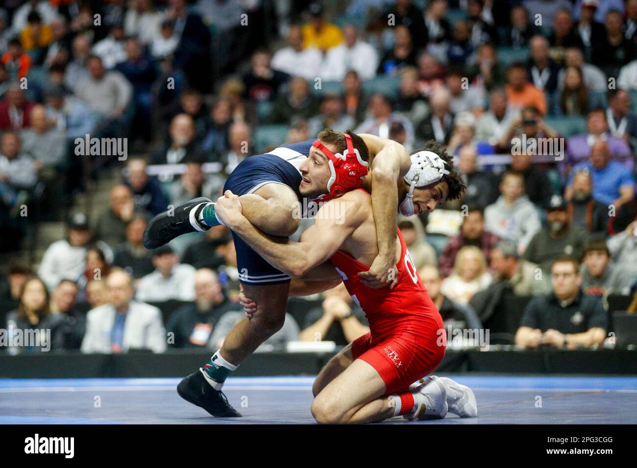 Cornell's Vito Arujau attempts to take down Penn State's Roman Bravo ...