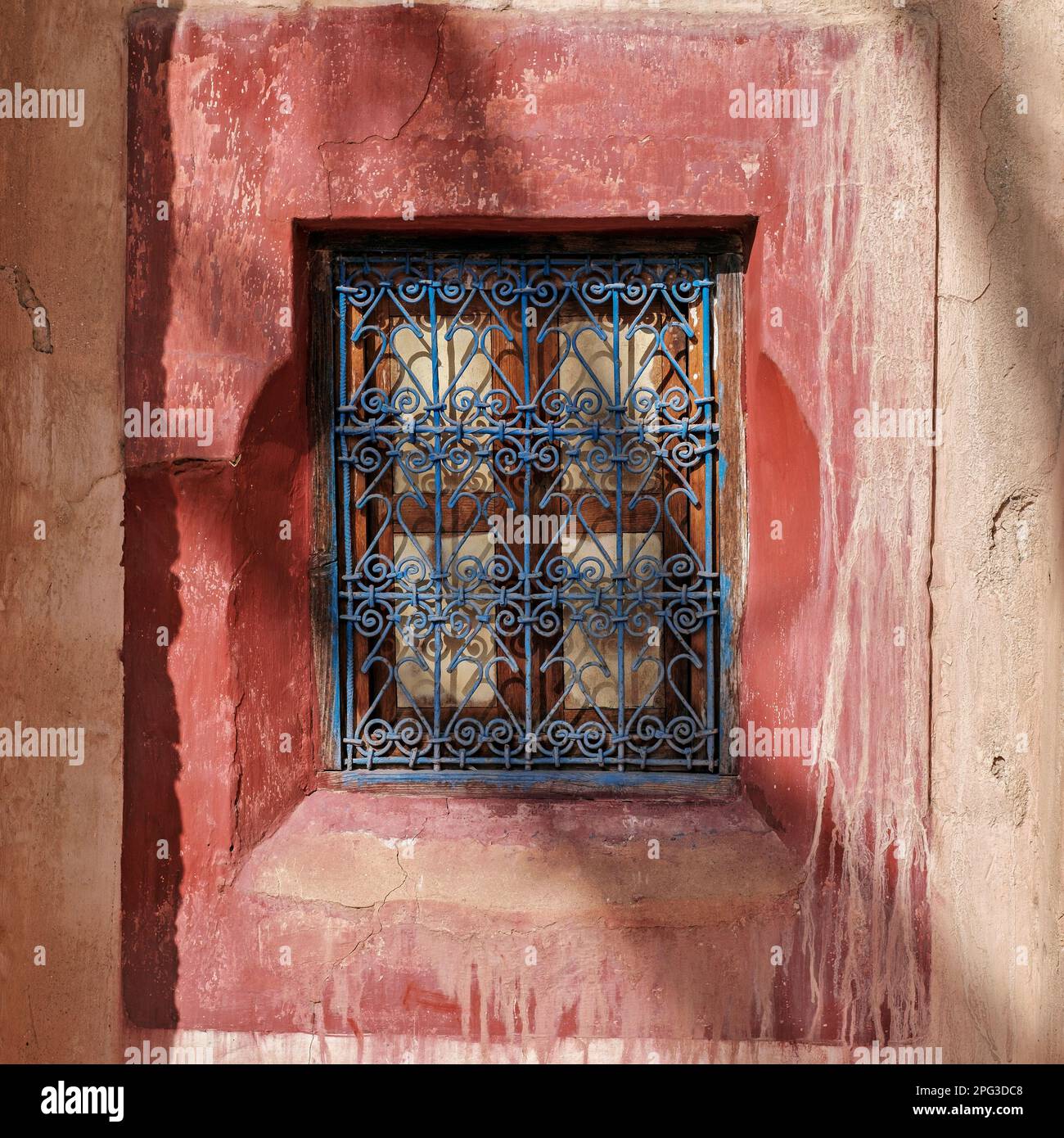 Inset window and decorative metalwork grill in Agadir, Morocco Stock ...