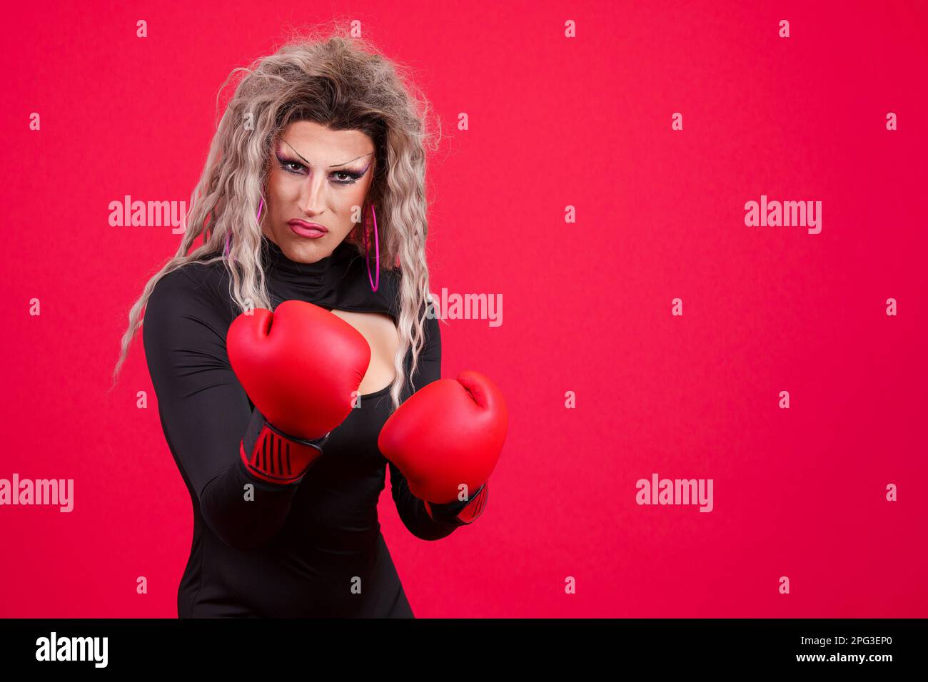 Transgender person with boxing gloves and agressive pose Stock Photo ...