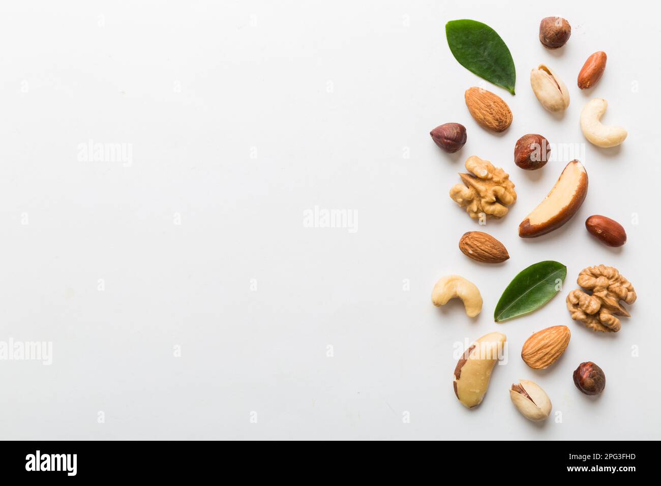 Composition of nuts , flat lay - mix hazelnuts, cashews, almonds on ...