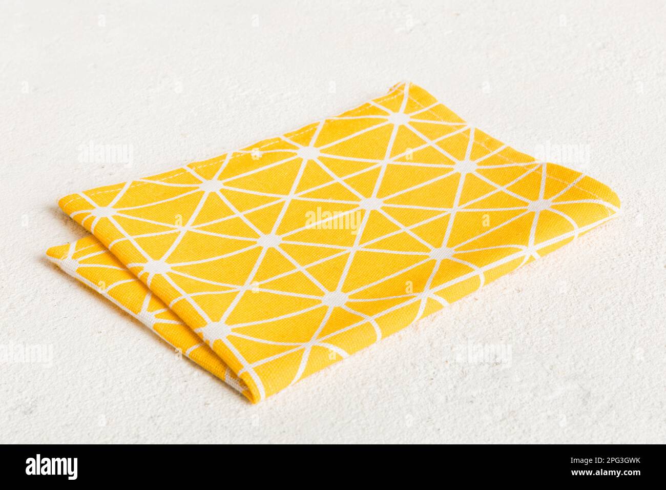 top view with yellow empty kitchen napkin isolated on table background ...