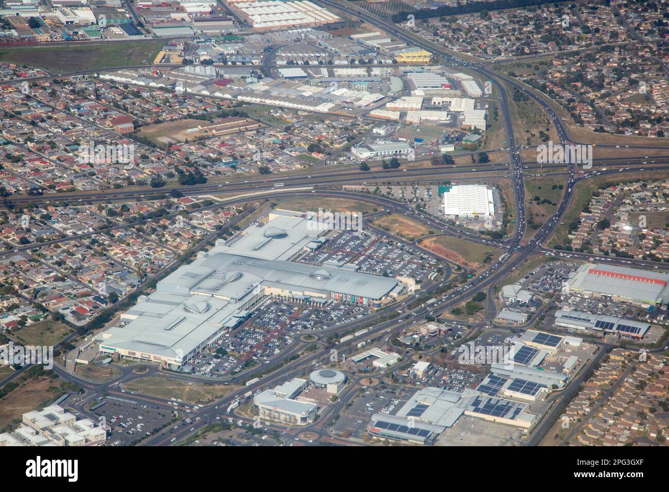 Fully developed urban area with a large shopping mall surrounded by ...