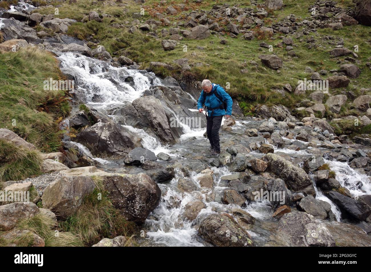 Man (Hiker) Walking on Gatherstone Beck Waterfall at Gatherstone Head ...