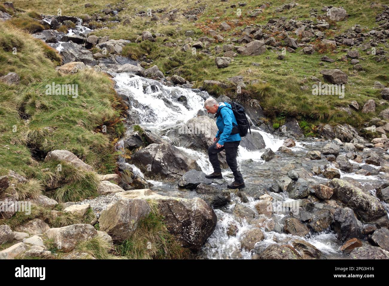 Man (Hiker) Walking on Gatherstone Beck Waterfall at Gatherstone Head ...