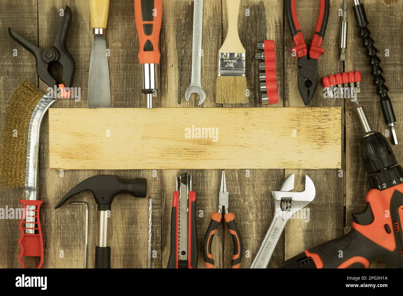 Tools on a rustic background with copy space. Working tools on a wooden ...