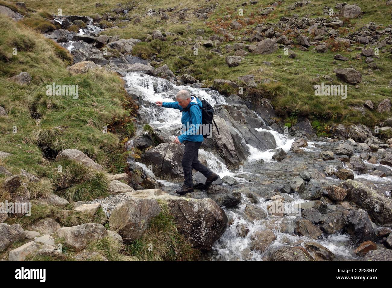 Man (Hiker) Walking on Gatherstone Beck Waterfall at Gatherstone Head ...
