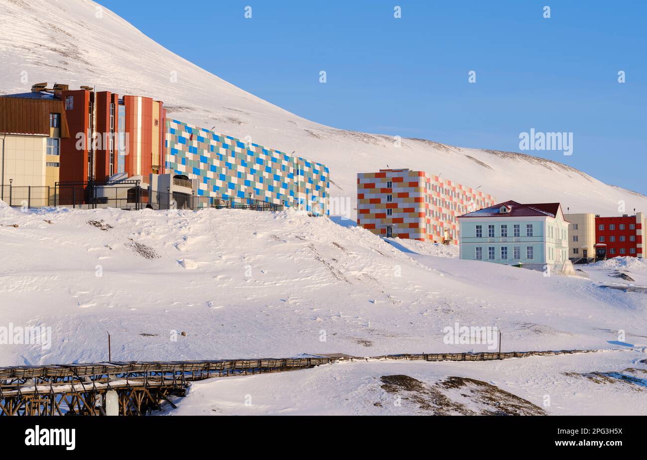 Russian coal mining town Barentsburg at fjord Groenfjorden, Svalbard. The coal mine is still in ...
