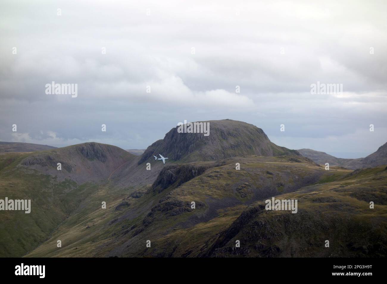 Low Flying Military Turboprop Cargo Plane Passing the Wainwrights Green ...