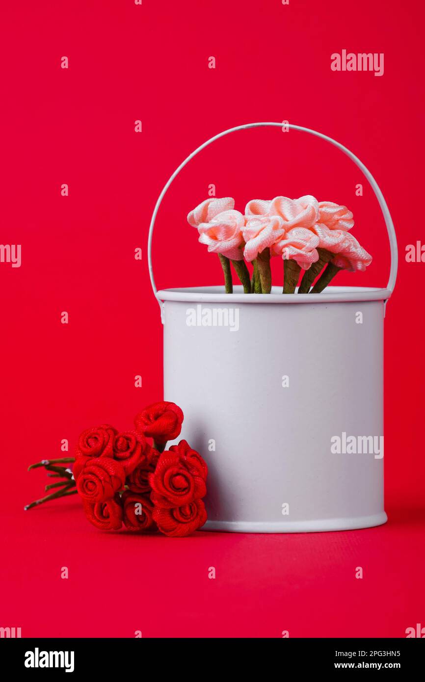 Pouring water red bucket hi-res stock photography and images - Alamy