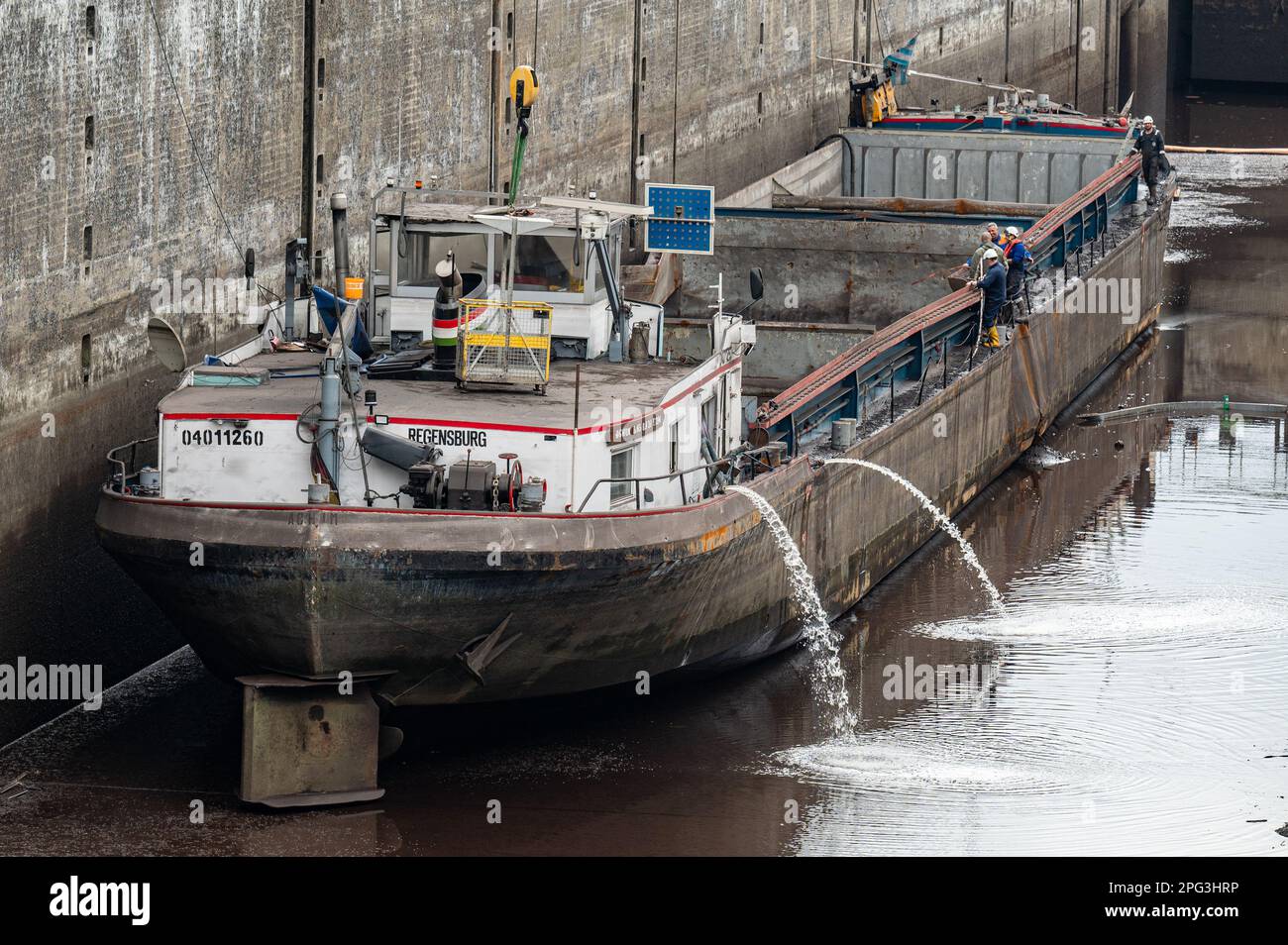 20 March 2023, Bavaria, Wörth An Der Donau: An 85-meter-long cargo ship ...