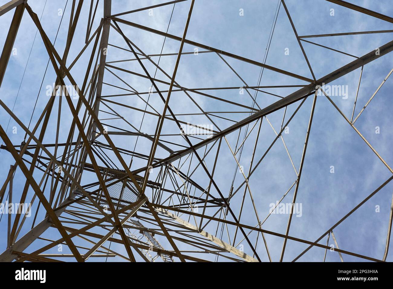 Electric power transmission tower structure seen from below Stock Photo ...