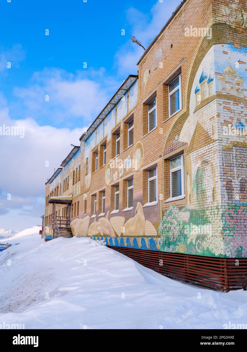 School with paintings, murals. Russian coal mining town Barentsburg at ...