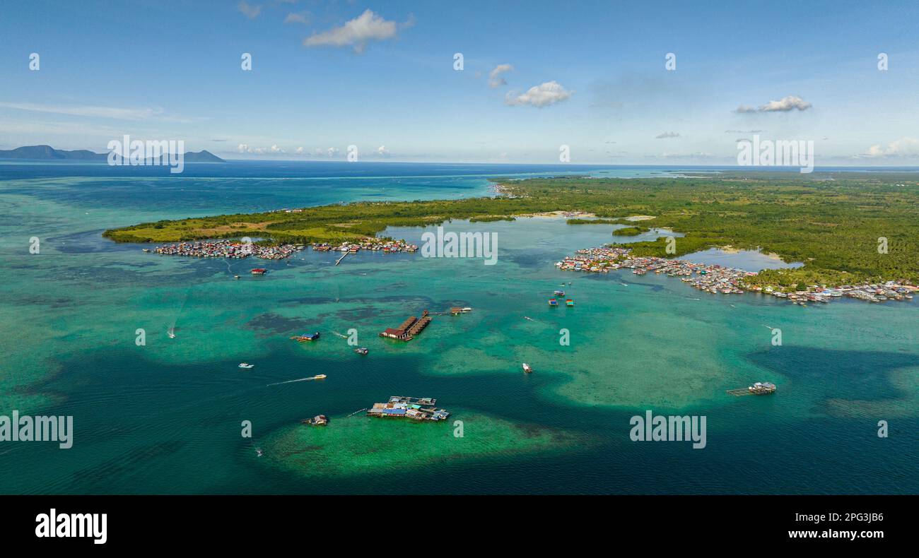 Aerial drone of coast of the island Bum Bum with towns and villages ...