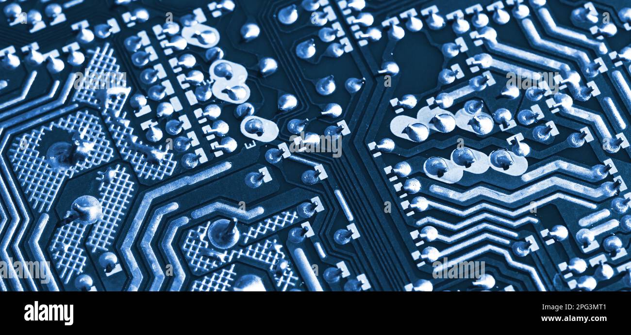 Blue toned panoramic photo of a printed circuit boards, close up Stock Photo - Alamy