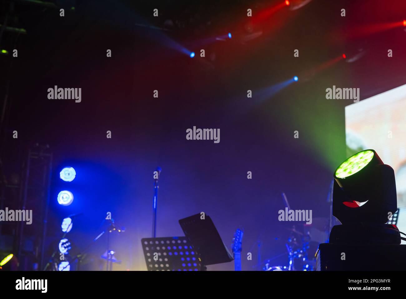 Performance scene background photo with colorful spot lights ...