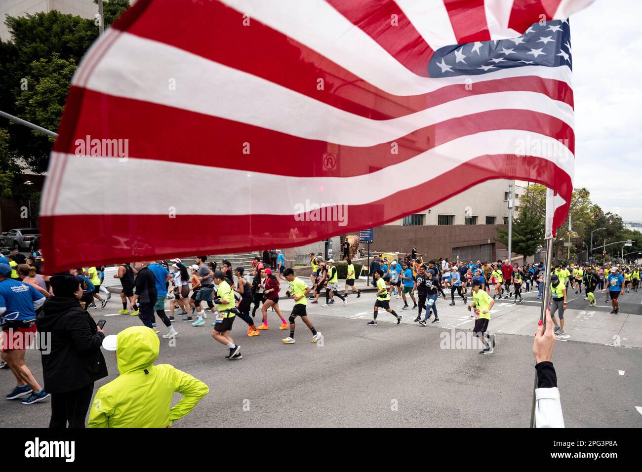 Runners head up a long hill on 1st street during the 38th LA Marathon ...