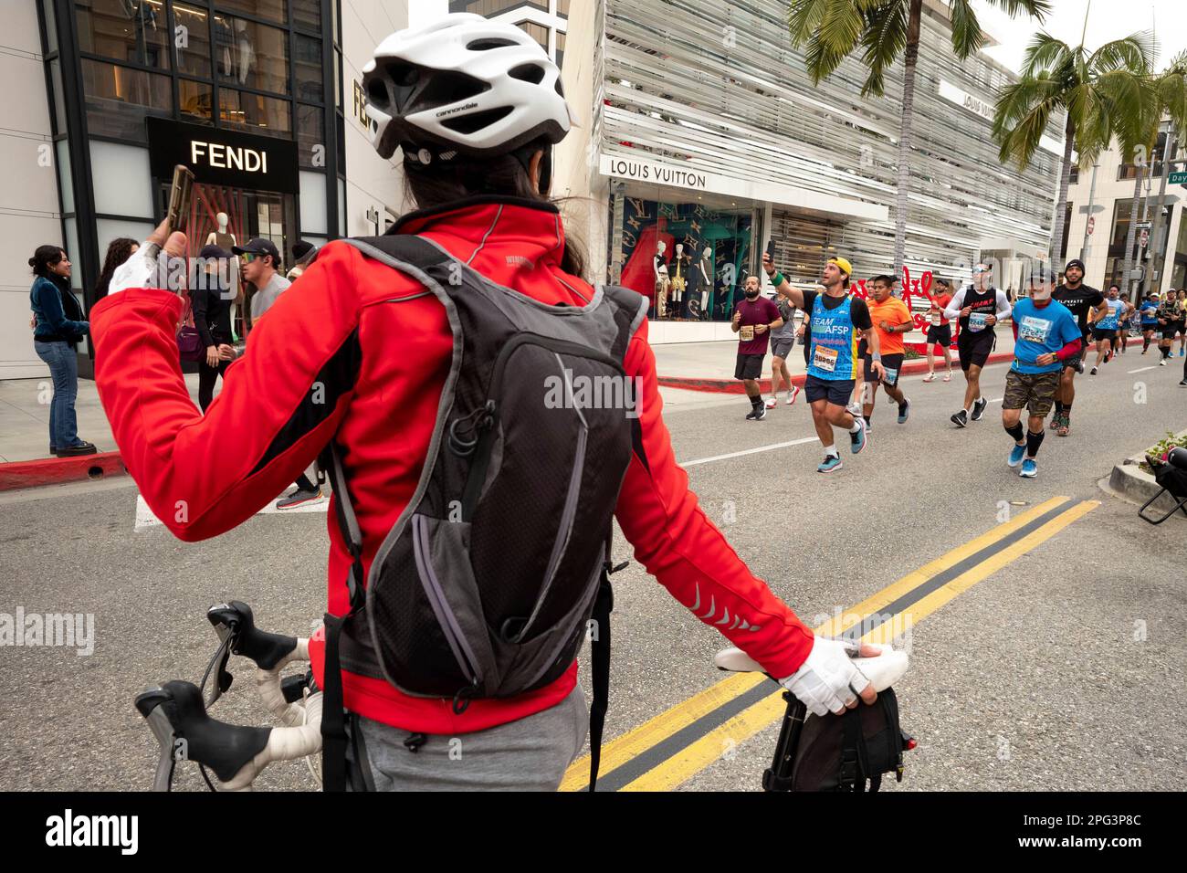 Runners head up Rodeo Drive in Beverly Hills during the 38th LA ...