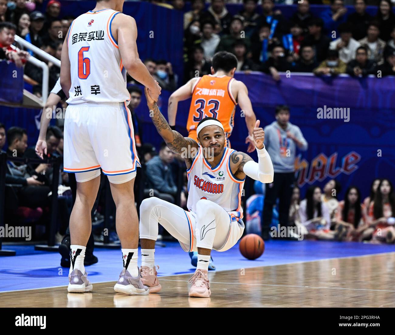 Chengdu, China's Sichuan Province. 20th Mar, 2023. Marlain Veal (R) of ...