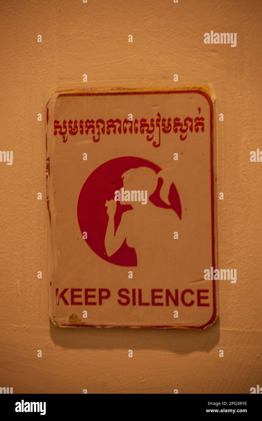 Bilingual sign inside a hotel, Phnom Penh, Cambodia. © Kraig Lieb Stock ...