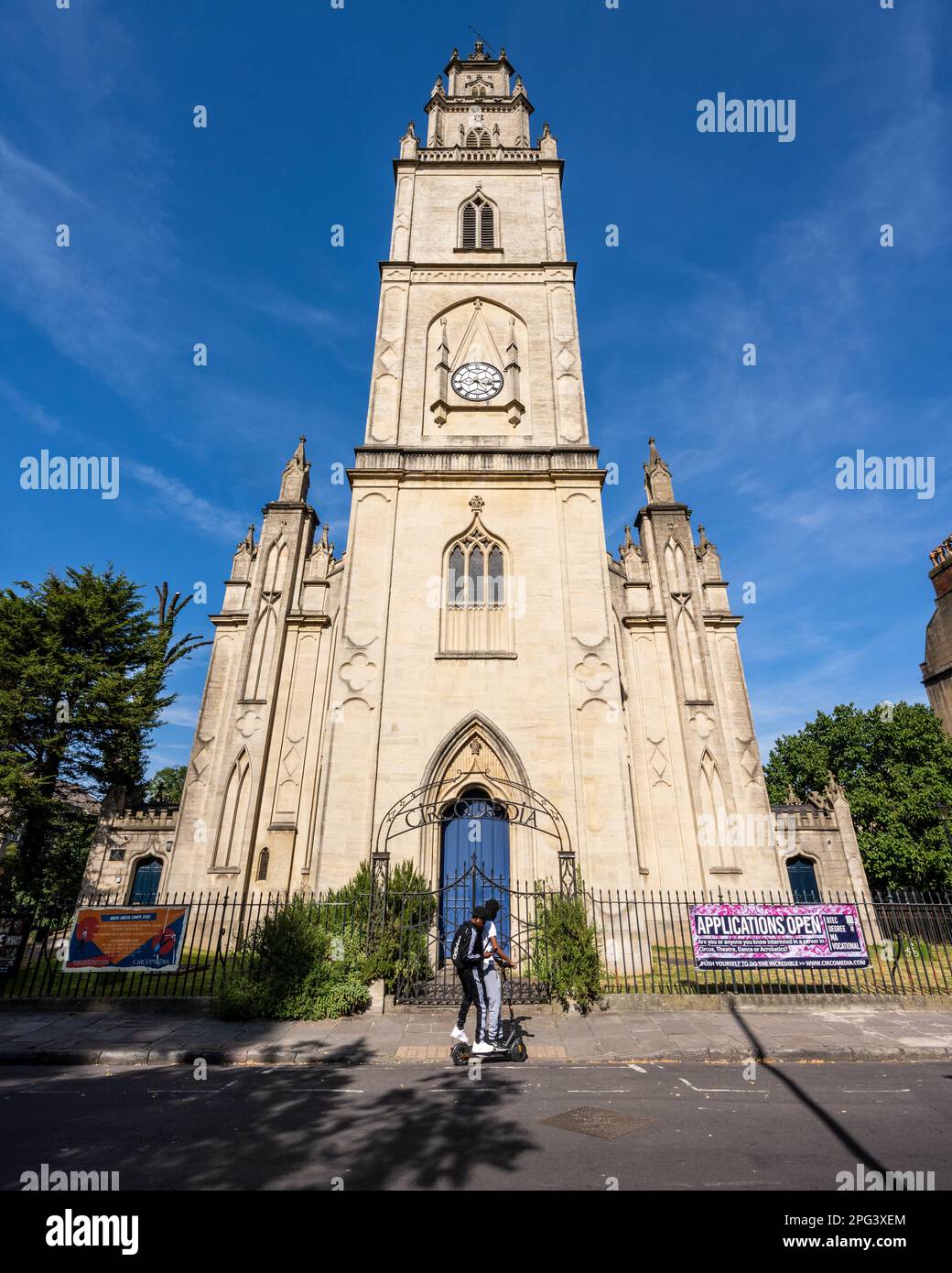 Sun shines on the tower of St Paul's Church in inner city Bristol ...