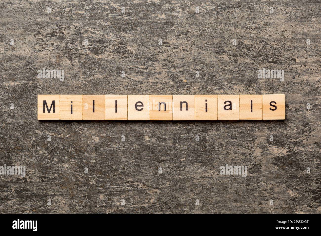 millennials word written on wood block. millennials text on table ...