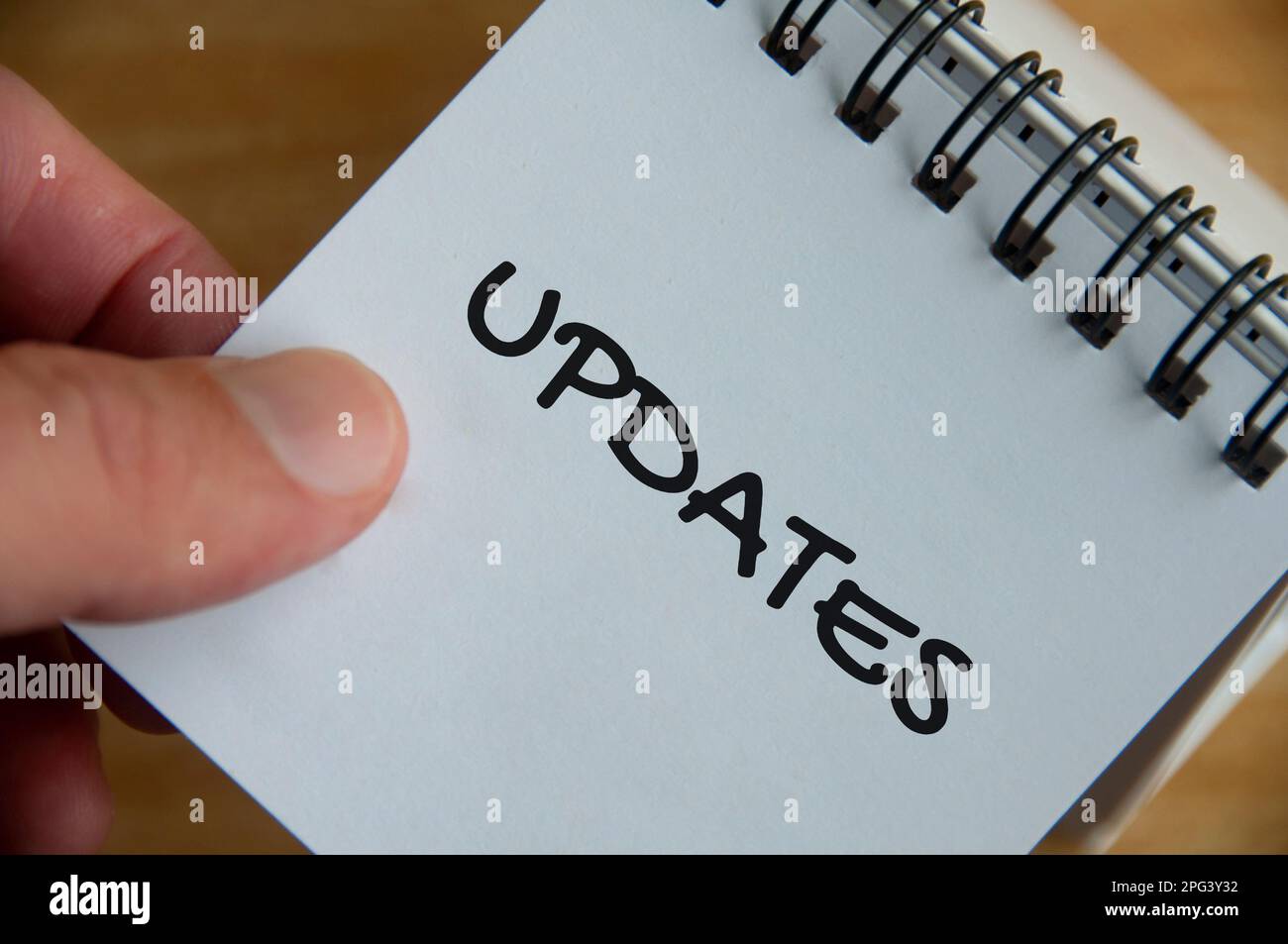 Top view of Update text on white notepad. Business update concept Stock ...