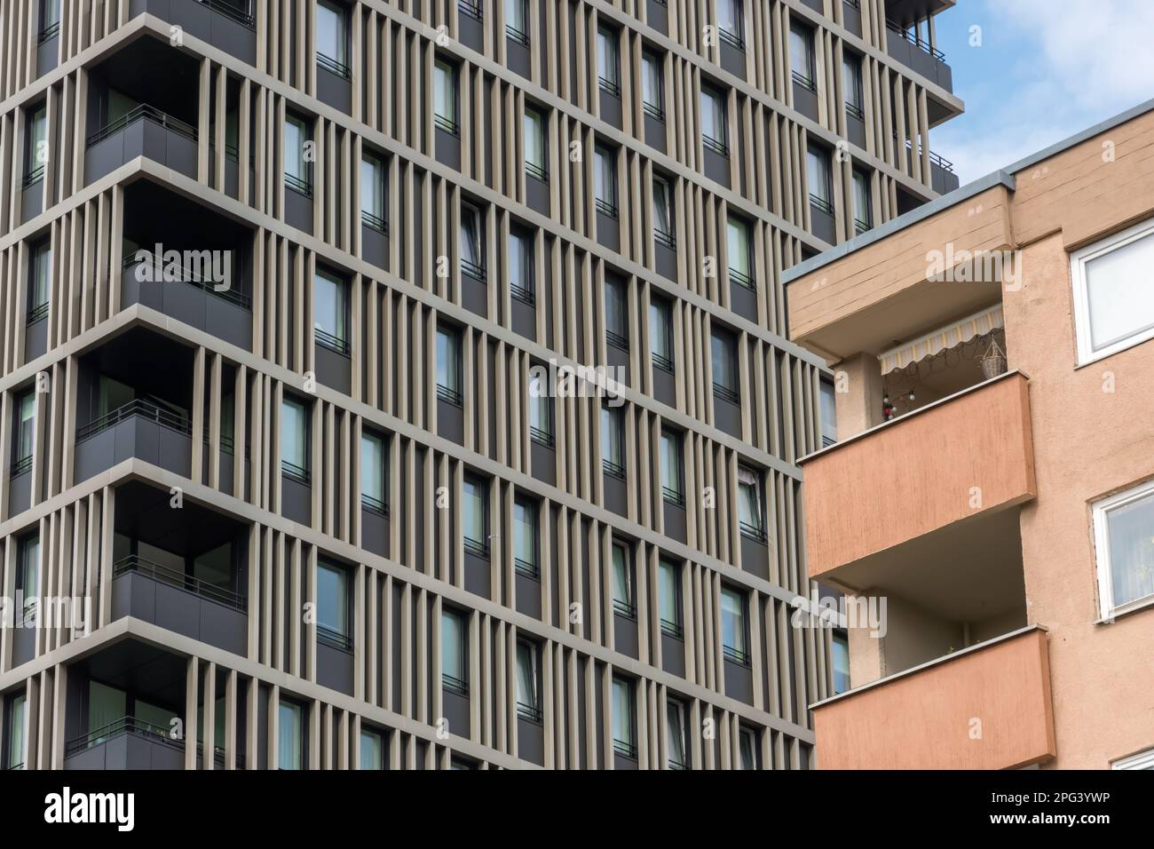 An orange colored multi-family house for a new building in Berlin ...