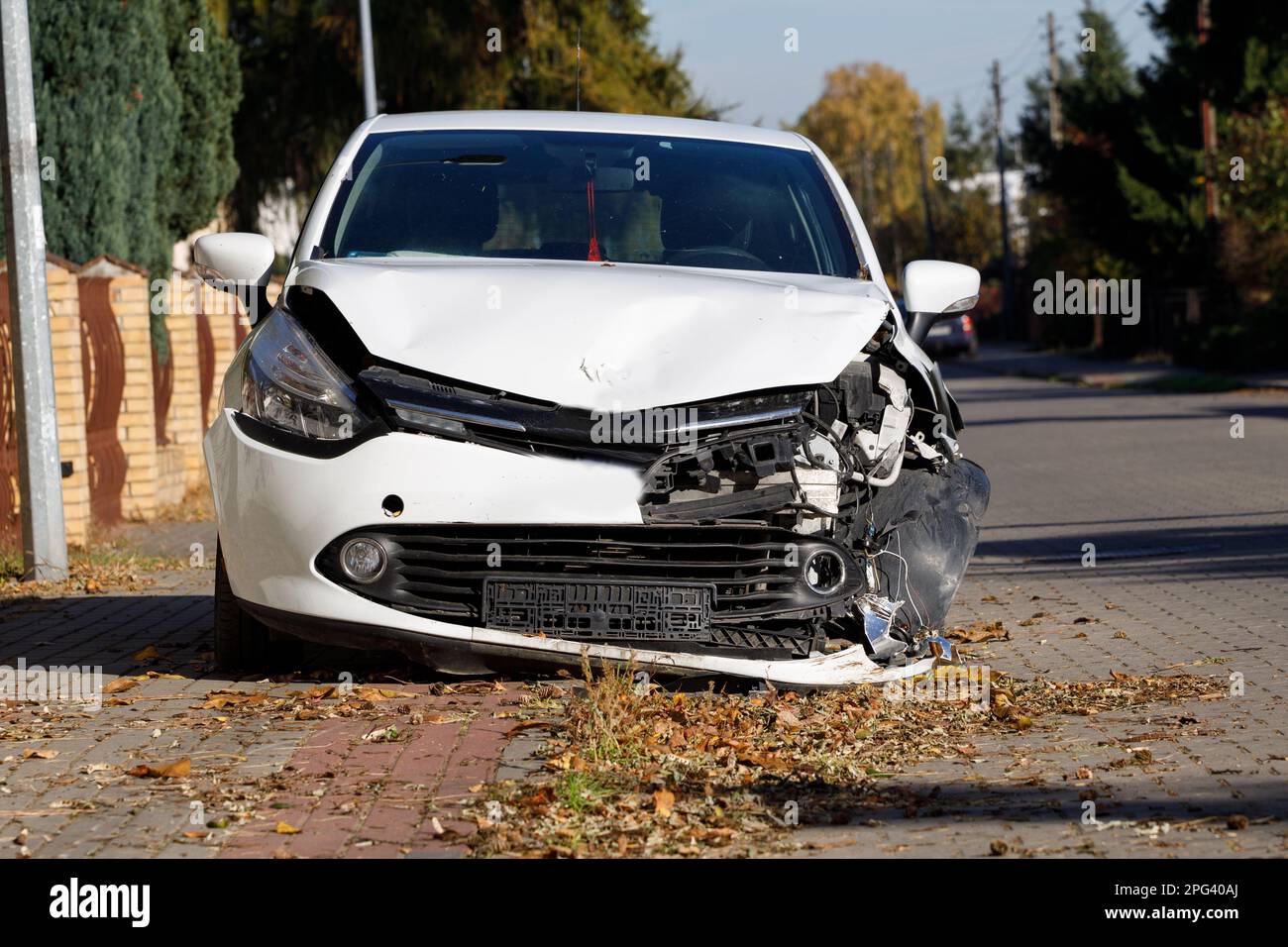 Front Broken white crash white car after an accident Stock Photo - Alamy