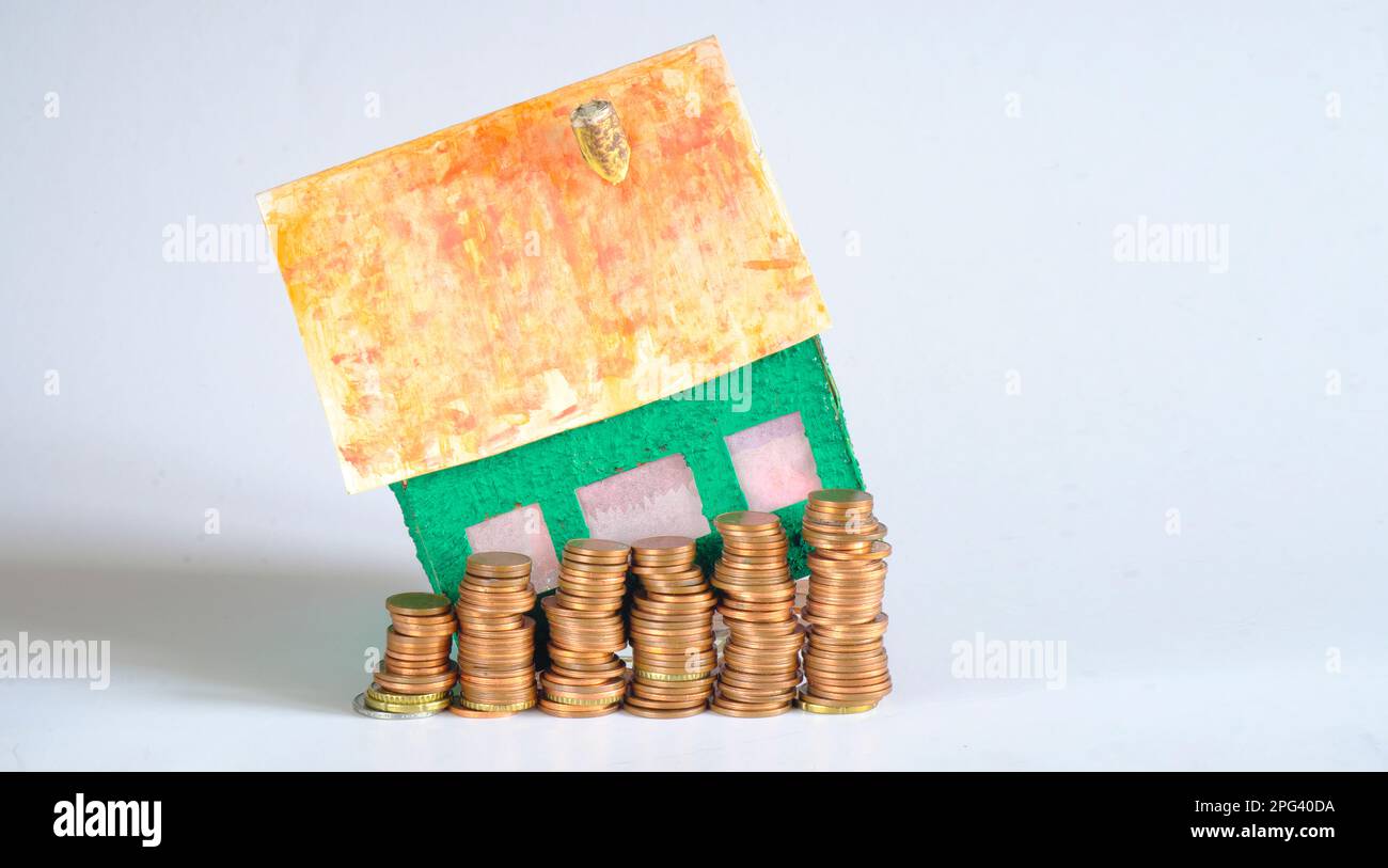 Rising costs for house renovation and prices for homes, model home with ...