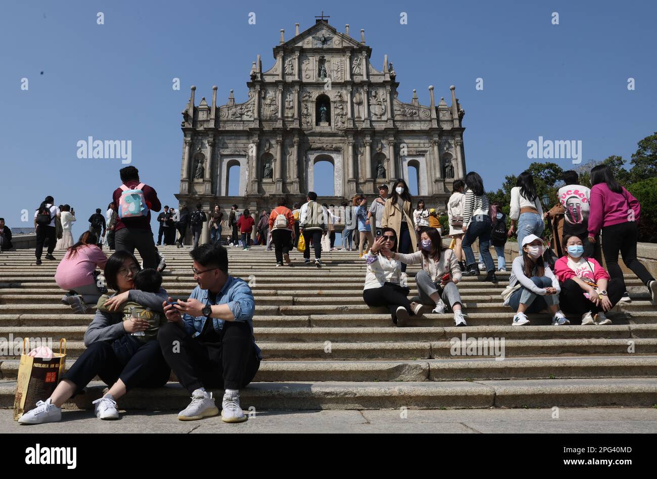 Travelers take off face mask at Ruínas de São Paulo in Macau during ...
