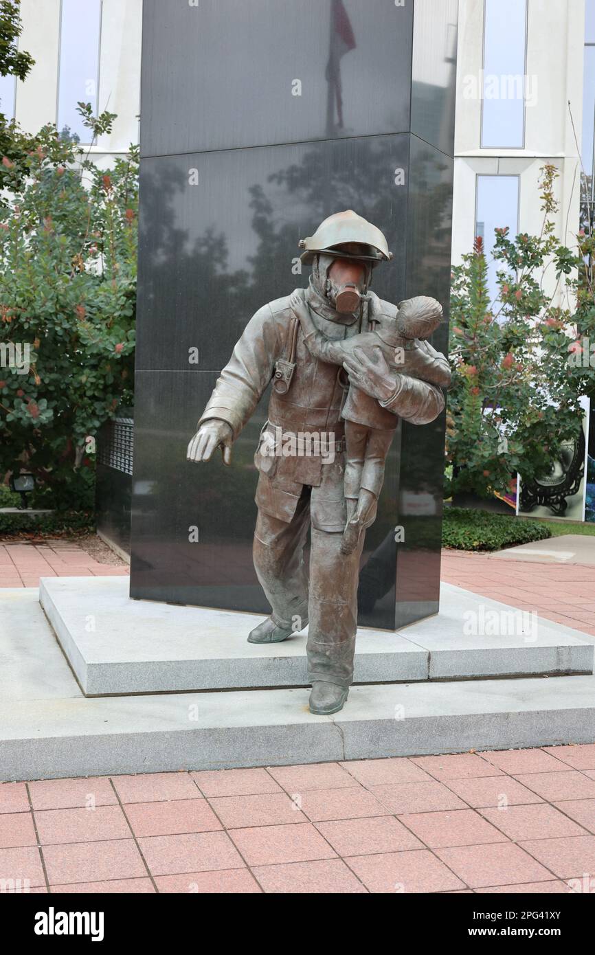 Ontario Firefighters Memorial - firefighter and child. Hero Stock Photo ...