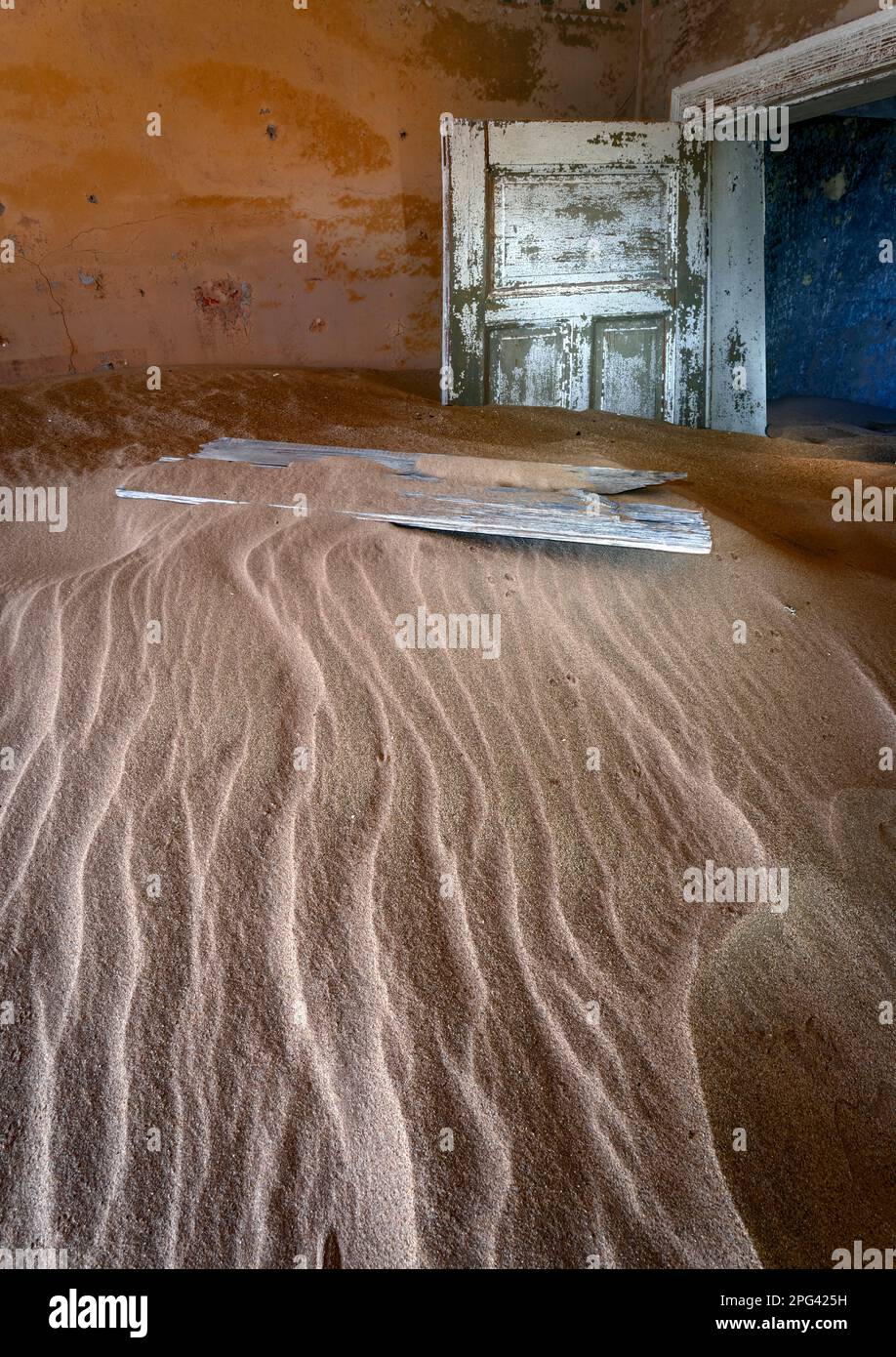 Sand filled rooms in the houses of the Namib Ghost town of Kolmanskop ...