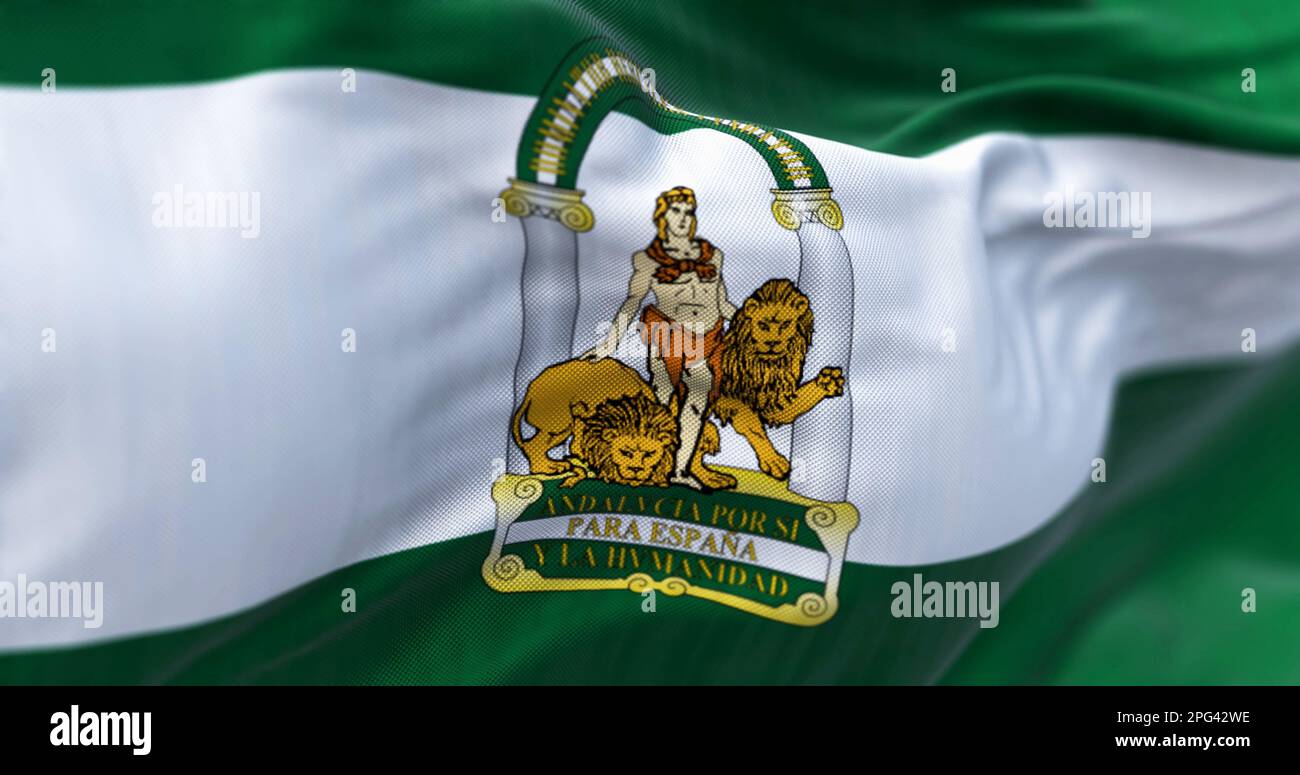 The Andalusia flag waving. Three horizontal stripes: green, white and ...