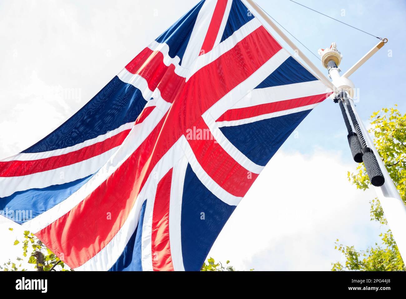 Union flag decorations on The Mall in London as people gather around ...