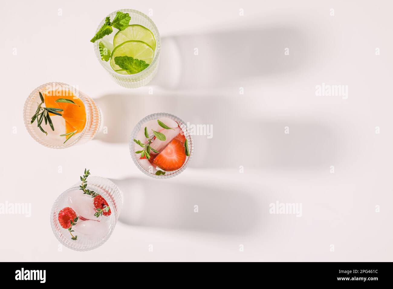 Infused waters with different flavors, summer refreshing drinks in a ...