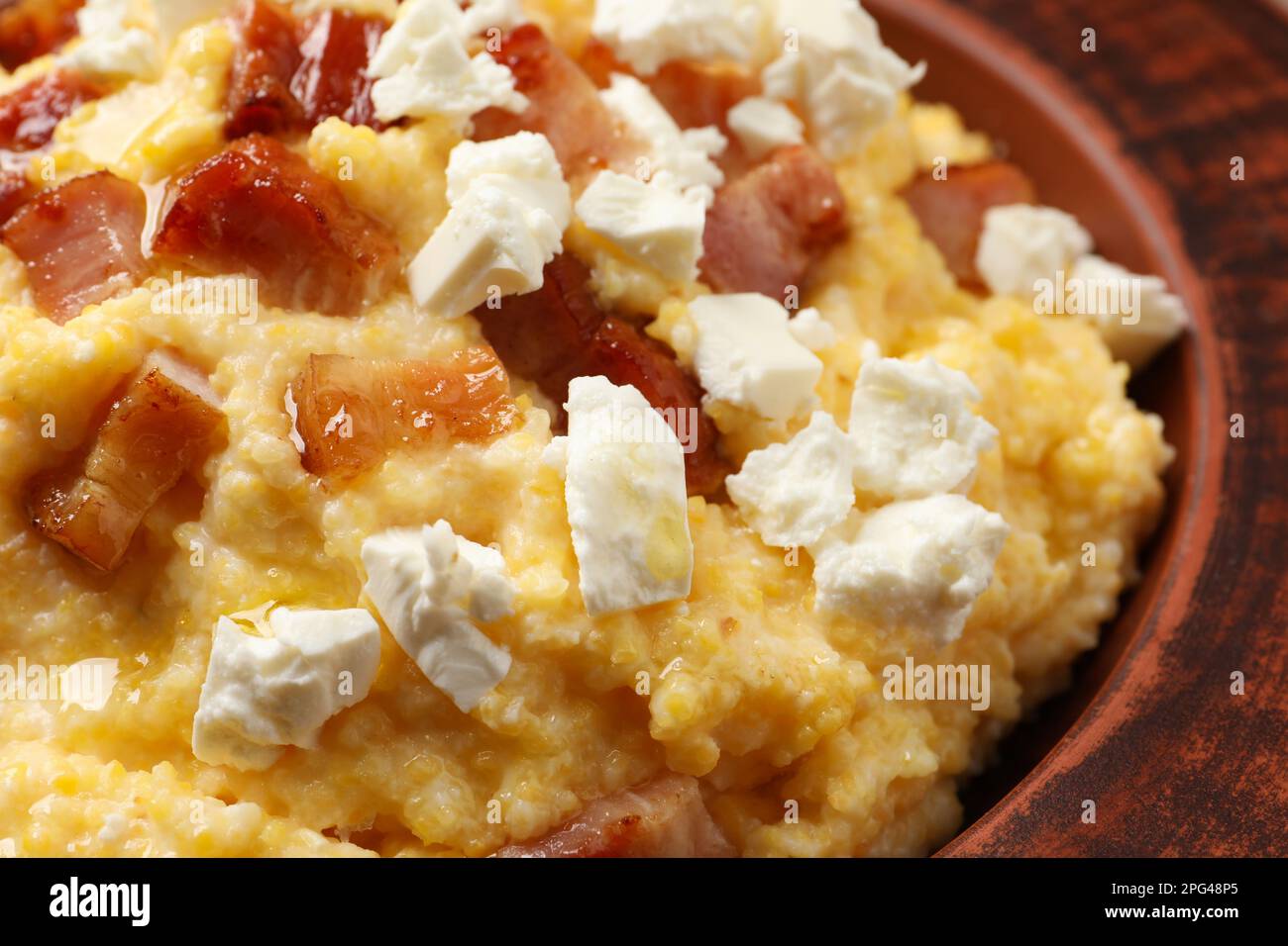 Delicious traditional Ukrainian banosh in bowl, closeup Stock Photo - Alamy