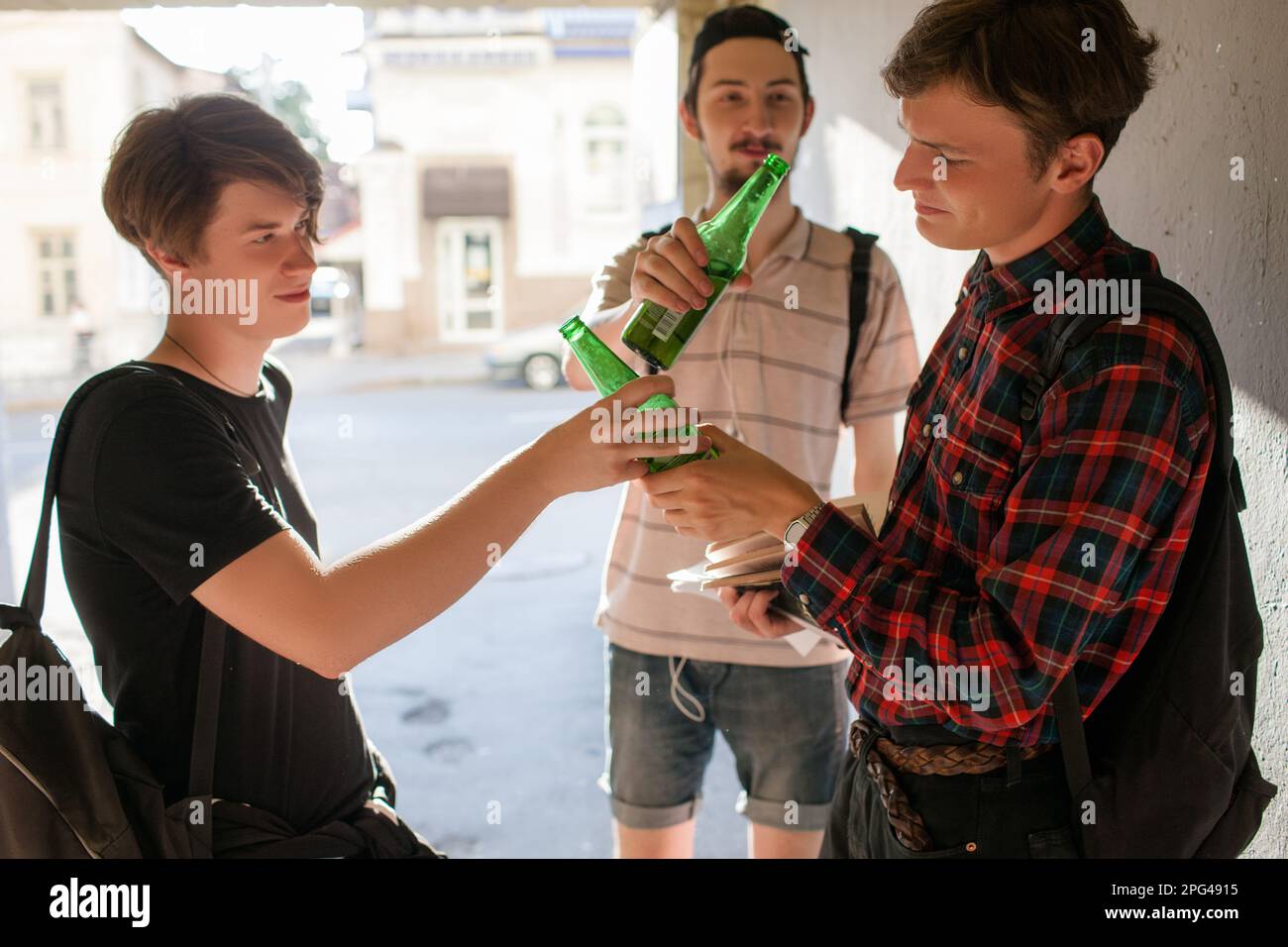 teenage boy bad influence drinking alcohol Stock Photo - Alamy