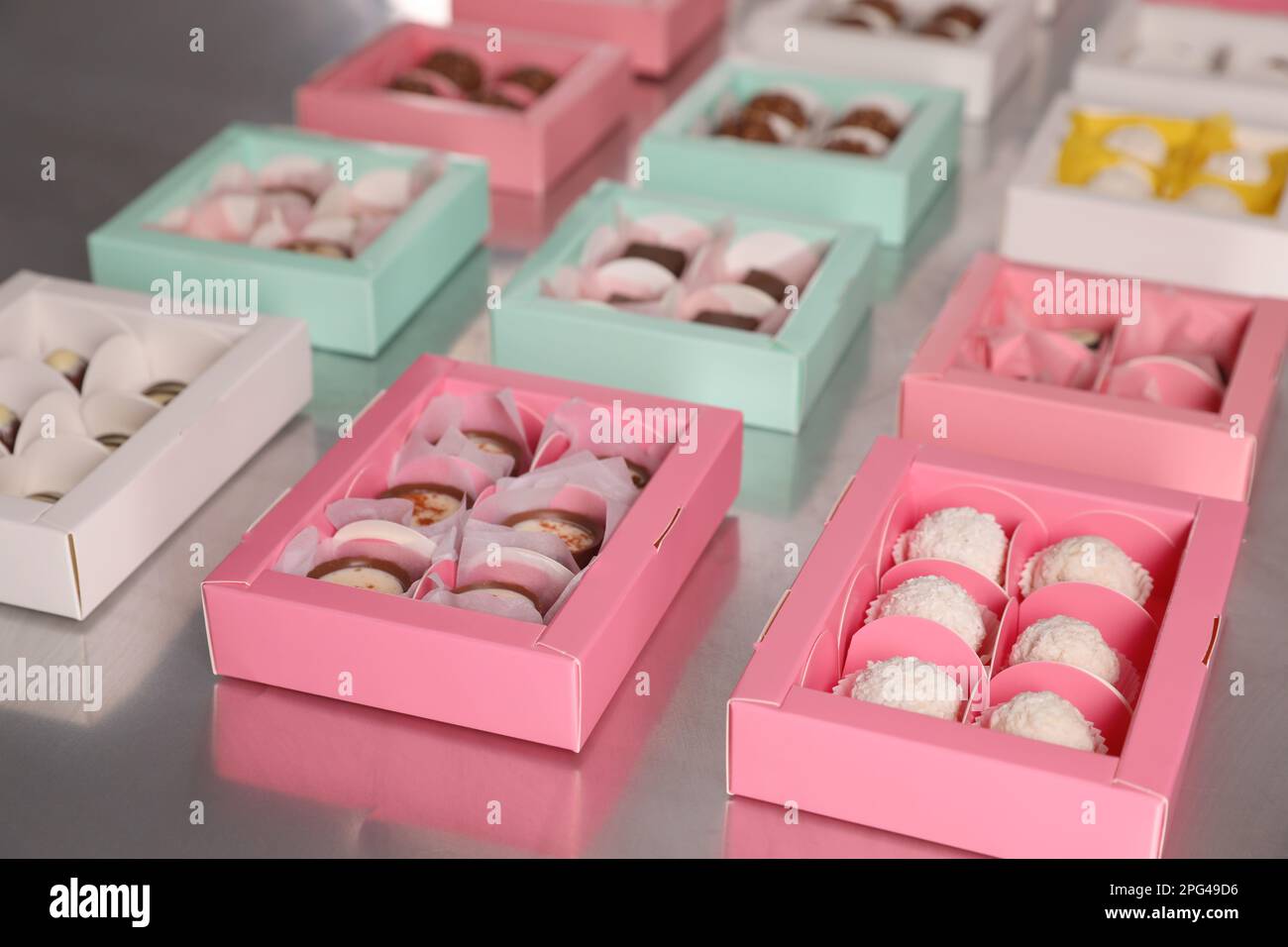 Box candies on conveyor candy hi-res stock photography and images - Alamy