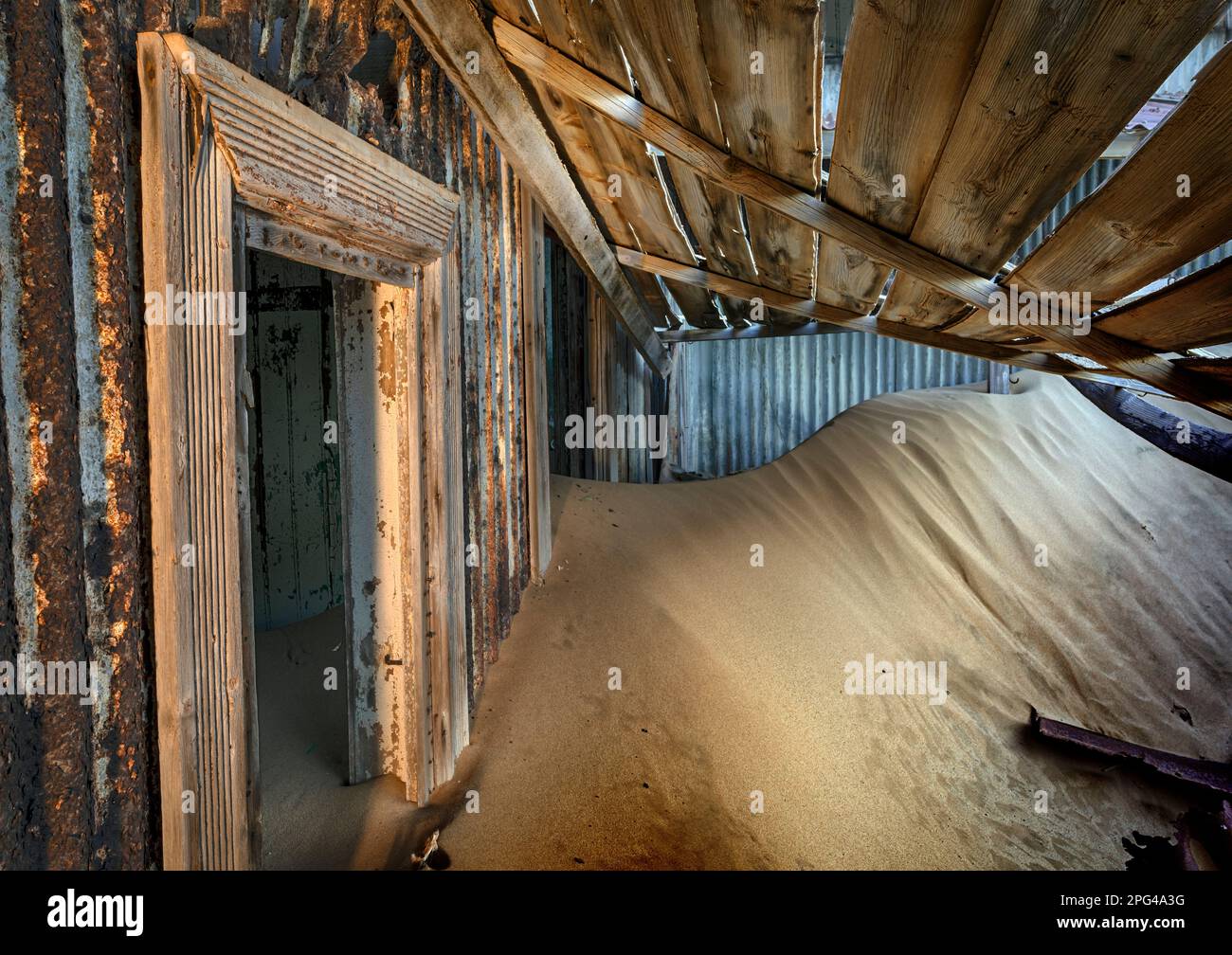 Sand filled rooms in the houses of the Namib Ghost town of Kolmanskop ...